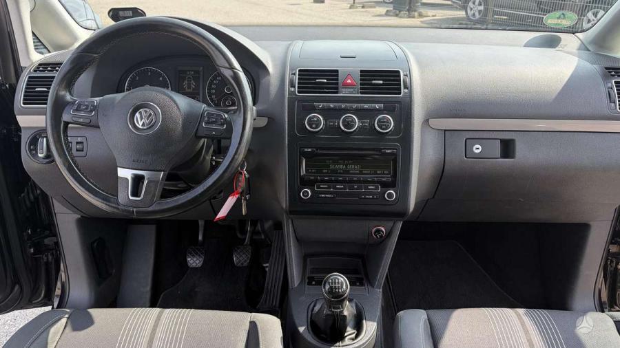 Black Volkswagen Touran 2012 in Marijampole, with an engine capacity of 1.97 L and mileage of 246 thousand km for 6000 €, photo 25 on AUTOMOTO.COM.LV
