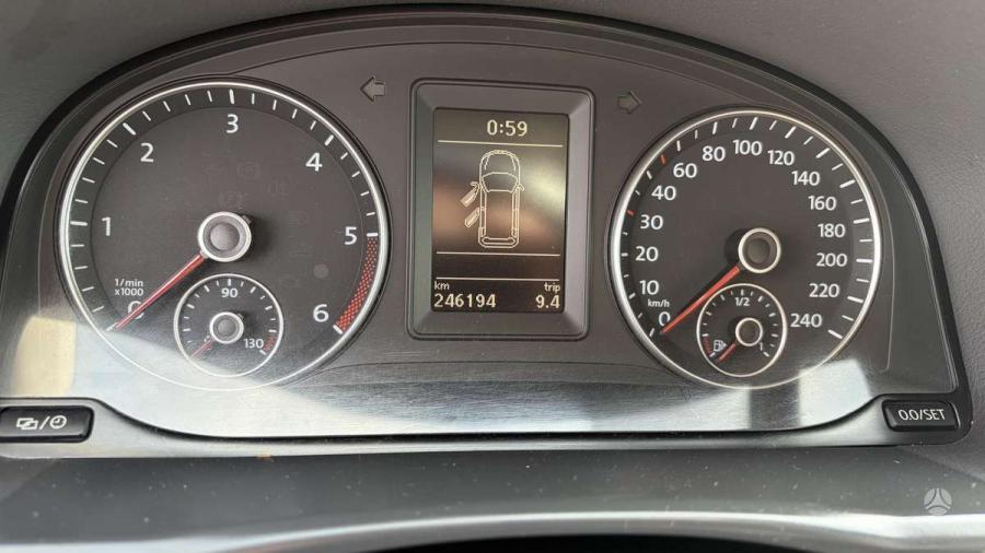 Black Volkswagen Touran 2012 in Marijampole, with an engine capacity of 1.97 L and mileage of 246 thousand km for 6000 €, photo 31 on AUTOMOTO.COM.LV