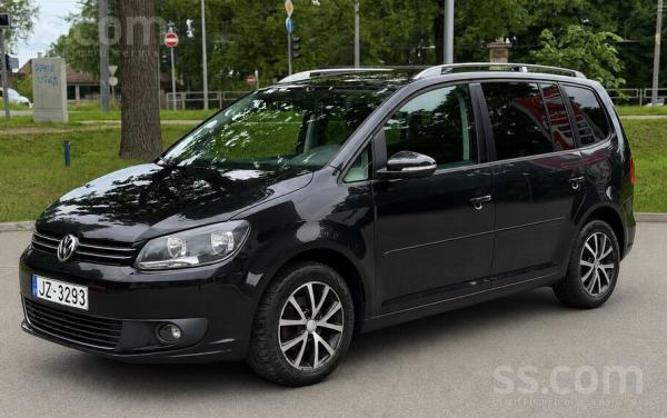 Melns Volkswagen Touran 2012 Rīga, ar dzinēja tilpumu 1.60 L un nobraukumu 241 tūkst. km par 5100 €, foto 2 vietnē AUTOMOTO.COM.LV