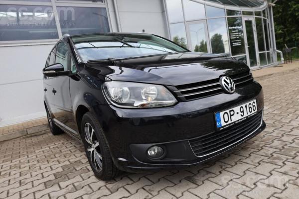 Melns Volkswagen Touran 2012 Rīga, ar dzinēja tilpumu 1.60 L un nobraukumu 0 tūkst. km par 6495 €, foto 5 vietnē AUTOMOTO.COM.LV