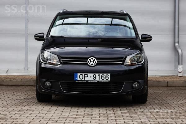 Melns Volkswagen Touran 2012 Rīga, ar dzinēja tilpumu 1.60 L un nobraukumu 0 tūkst. km par 6495 €, foto 3 vietnē AUTOMOTO.COM.LV