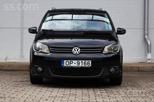 Black Volkswagen Touran 2012 in Riga, with an engine capacity of 1.60 L and mileage of 0 thousand km for 6495 €, photo 4 on AUTOMOTO.COM.LV