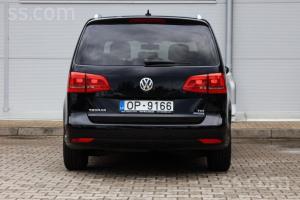 Black Volkswagen Touran 2012 in Riga, with an engine capacity of 1.60 L and mileage of 0 thousand km for 6495 €, photo 8 on AUTOMOTO.COM.LV
