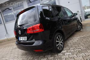 Black Volkswagen Touran 2012 in Riga, with an engine capacity of 1.60 L and mileage of 0 thousand km for 6495 €, photo 10 on AUTOMOTO.COM.LV