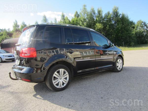 Melns Volkswagen Touran 2012 Rīga, ar dzinēja tilpumu 2.00 L un nobraukumu 349 tūkst. km par 5300 €, foto 3 vietnē AUTOMOTO.COM.LV