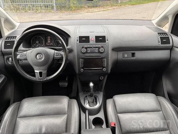 Black Volkswagen Touran 2012 in Riga, with an engine capacity of 2.00 L and mileage of 217 thousand km for 7200 €, photo 5 on AUTOMOTO.COM.LV