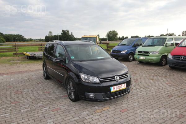 Melns Volkswagen Touran 2012 Liepāja, ar dzinēja tilpumu 2.00 L un nobraukumu 276 tūkst. km par 7600 €, foto 2 vietnē AUTOMOTO.COM.LV