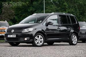 Black Volkswagen Touran 2012 in Riga, with an engine capacity of 1.40 L and mileage of 176 thousand km for 6990 €, photo  on AUTOMOTO.COM.LV