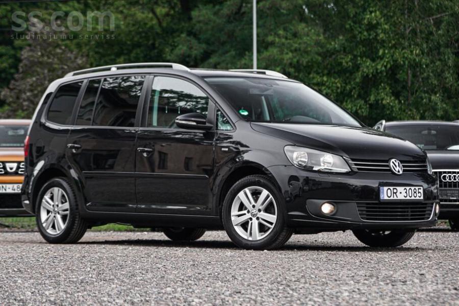 Black Volkswagen Touran 2012 in Riga, with an engine capacity of 1.40 L and mileage of 176 thousand km for 6990 €, photo 3 on AUTOMOTO.COM.LV