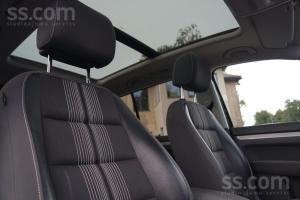 Black Volkswagen Touran 2012 in Riga, with an engine capacity of 1.40 L and mileage of 176 thousand km for 6990 €, photo 8 on AUTOMOTO.COM.LV