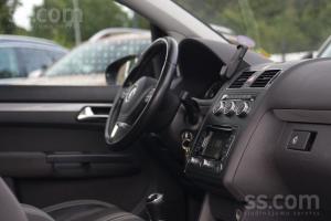 Black Volkswagen Touran 2012 in Riga, with an engine capacity of 1.40 L and mileage of 176 thousand km for 6990 €, photo 9 on AUTOMOTO.COM.LV