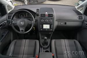 Black Volkswagen Touran 2012 in Riga, with an engine capacity of 1.40 L and mileage of 176 thousand km for 6990 €, photo 11 on AUTOMOTO.COM.LV