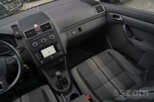 Black Volkswagen Touran 2012 in Riga, with an engine capacity of 1.40 L and mileage of 176 thousand km for 6990 €, photo 12 on AUTOMOTO.COM.LV