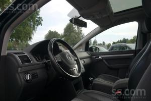 Black Volkswagen Touran 2012 in Riga, with an engine capacity of 1.40 L and mileage of 176 thousand km for 6990 €, photo 13 on AUTOMOTO.COM.LV