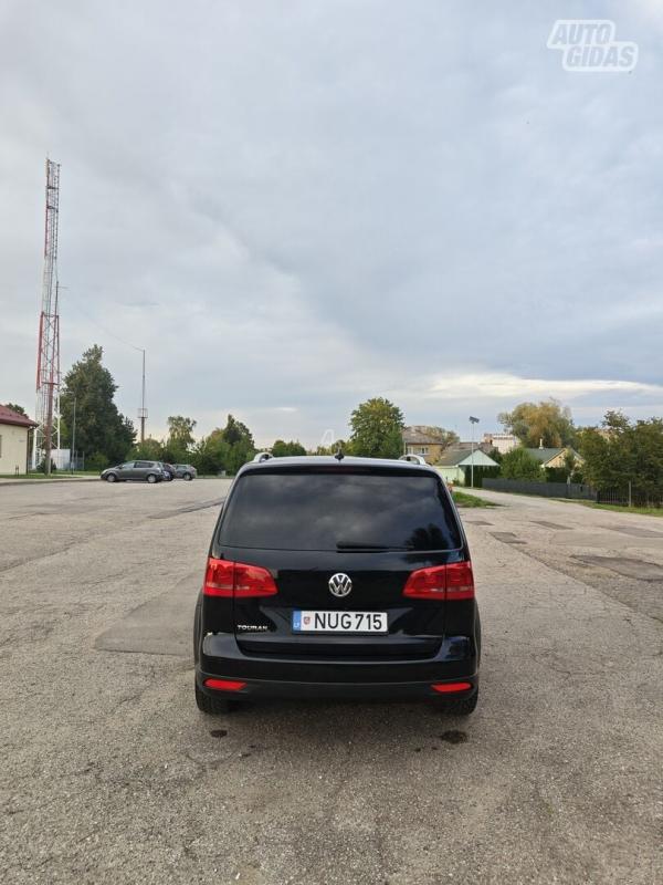 Volkswagen Touran 2012 Joniškis vietnē Melns Volkswagen Touran 2012 Joniškis, ar dzinēja tilpumu 2.00 L un nobraukumu 284 tūkst. km par 5400 €, foto 7 vietnē AUTOMOTO.COM.LV