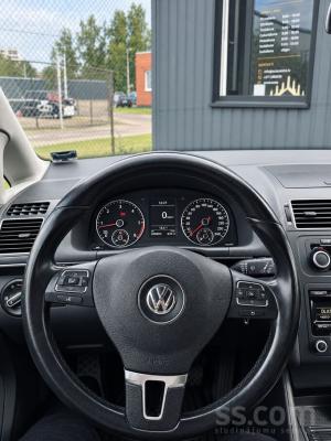 Melns Volkswagen Touran 2012 Rīga, ar dzinēja tilpumu 2.00 L un nobraukumu 267 tūkst. km par 4990 €, foto 22 vietnē AUTOMOTO.COM.LV