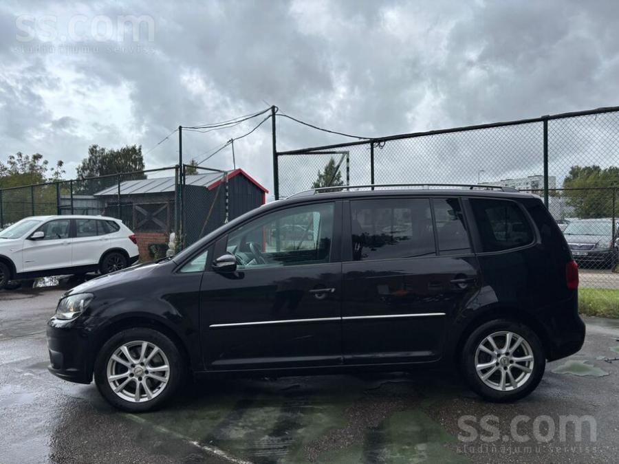 Melns Volkswagen Touran 2012 Rīga, ar dzinēja tilpumu 2.00 L un nobraukumu 267 tūkst. km par 4990 €, foto 5 vietnē AUTOMOTO.COM.LV