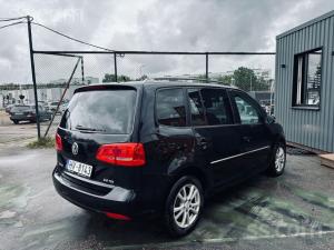 Melns Volkswagen Touran 2012 Rīga, ar dzinēja tilpumu 2.00 L un nobraukumu 267 tūkst. km par 4990 €, foto 8 vietnē AUTOMOTO.COM.LV