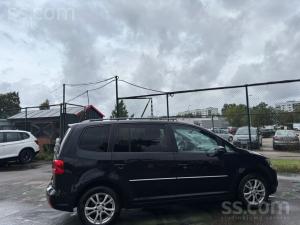 Melns Volkswagen Touran 2012 Rīga, ar dzinēja tilpumu 2.00 L un nobraukumu 267 tūkst. km par 4990 €, foto 9 vietnē AUTOMOTO.COM.LV