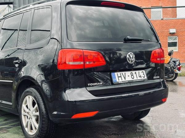Black Volkswagen Touran 2012 in Riga, with an engine capacity of 2.00 L and mileage of 267 thousand km for 4990 €, photo 11 on AUTOMOTO.COM.LV