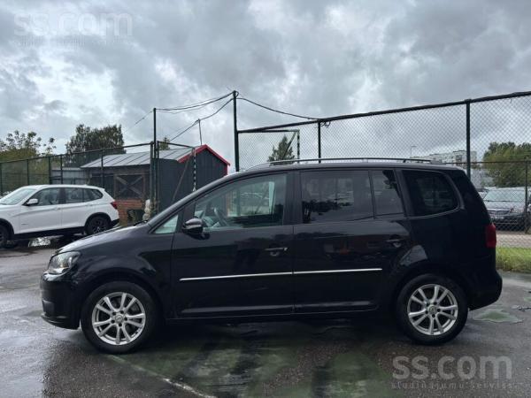 Melns Volkswagen Touran 2012 Rīga, ar dzinēja tilpumu 2.00 L un nobraukumu 267 tūkst. km par 4990 €, foto 5 vietnē AUTOMOTO.COM.LV