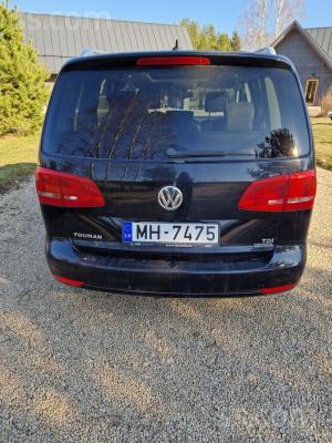 Black Volkswagen Touran 2013 in Riga, with an engine capacity of 1.60 L and mileage of 248 thousand km for 5000 €, photo 3 on AUTOMOTO.COM.LV