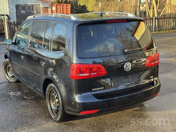 Melns Volkswagen Touran 2013 Rīga, ar dzinēja tilpumu 1.40 L un nobraukumu 225 tūkst. km par 7700 €, foto 4 vietnē AUTOMOTO.COM.LV