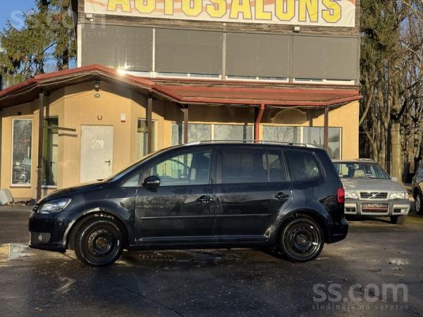 Melns Volkswagen Touran 2013 Rīga, ar dzinēja tilpumu 1.40 L un nobraukumu 225 tūkst. km par 7700 €, foto 5 vietnē AUTOMOTO.COM.LV
