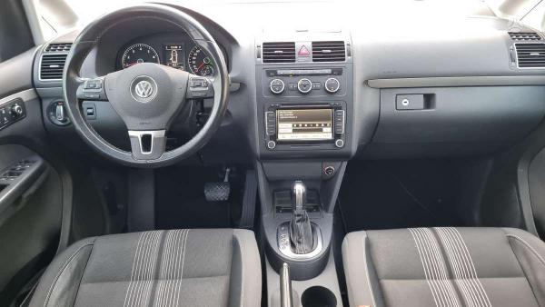 Black Volkswagen Touran 2013 in Vilnius, with an engine capacity of 1.40 L and mileage of 239 thousand km for 6660 €, photo 11 on AUTOMOTO.COM.LV