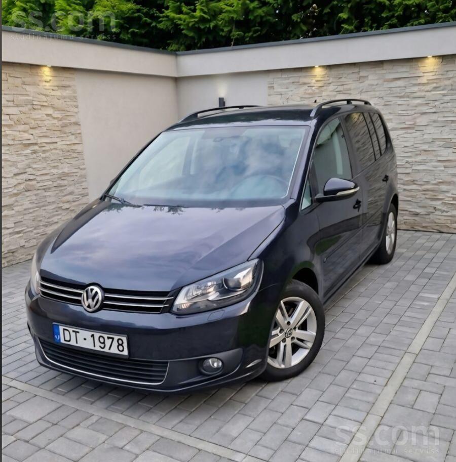 Melns Volkswagen Touran 2013 Rīga, ar dzinēja tilpumu 2.00 L un nobraukumu 320 tūkst. km par 5500 €, foto 1 vietnē AUTOMOTO.COM.LV