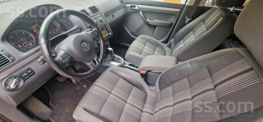 Melns Volkswagen Touran 2013 Rīga, ar dzinēja tilpumu 2.00 L un nobraukumu 320 tūkst. km par 5500 €, foto 8 vietnē AUTOMOTO.COM.LV