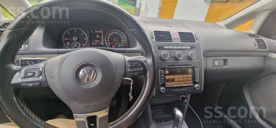 Melns Volkswagen Touran 2013 Rīga, ar dzinēja tilpumu 2.00 L un nobraukumu 320 tūkst. km par 5500 €, foto 10 vietnē AUTOMOTO.COM.LV