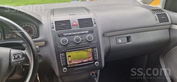 Black Volkswagen Touran 2013 in Riga, with an engine capacity of 2.00 L and mileage of 320 thousand km for 5500 €, photo 10 on AUTOMOTO.COM.LV