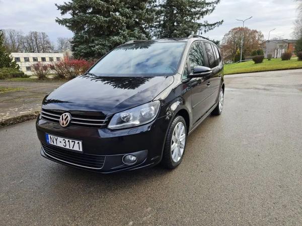 Black Volkswagen Touran 2013 in Jekabpils, with an engine capacity of 1.60 L and mileage of 274 thousand km for 6690 €, photo 10 on AUTOMOTO.COM.LV