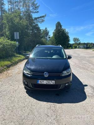 Black Volkswagen Touran 2013 in Ogre, with an engine capacity of 1.20 L and mileage of 239 thousand km for 6150 €, photo  on AUTOMOTO.COM.LV