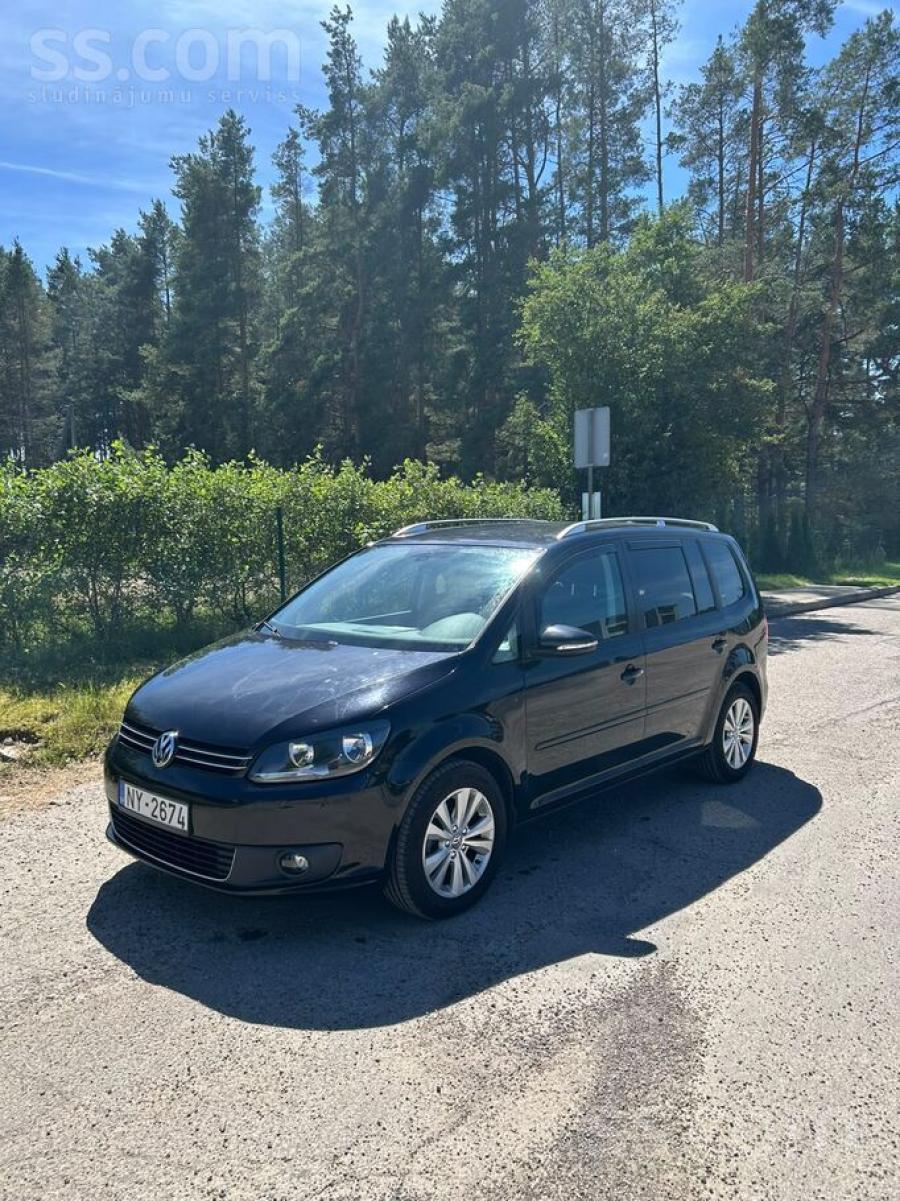 Melns Volkswagen Touran 2013 Ogre, ar dzinēja tilpumu 1.20 L un nobraukumu 239 tūkst. km par 6150 €, foto 7 vietnē AUTOMOTO.COM.LV