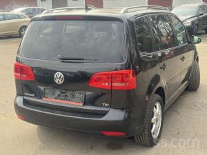 Black Volkswagen Touran 2013 in Riga, with an engine capacity of 1.40 L and mileage of 225 thousand km for 6950 €, photo  on AUTOMOTO.COM.LV