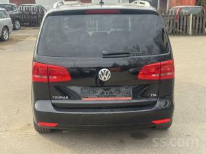 Black Volkswagen Touran 2013 in Riga, with an engine capacity of 1.40 L and mileage of 225 thousand km for 6950 €, photo 3 on AUTOMOTO.COM.LV