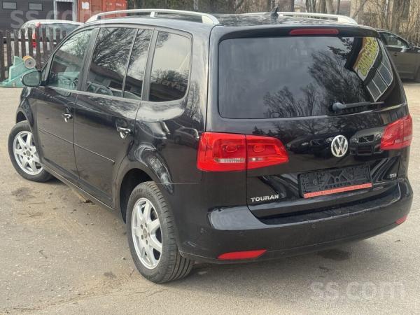 Melns Volkswagen Touran 2013 Rīga, ar dzinēja tilpumu 1.40 L un nobraukumu 225 tūkst. km par 6950 €, foto 3 vietnē AUTOMOTO.COM.LV
