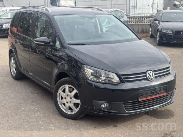 Melns Volkswagen Touran 2013 Rīga, ar dzinēja tilpumu 1.40 L un nobraukumu 225 tūkst. km par 6950 €, foto 4 vietnē AUTOMOTO.COM.LV