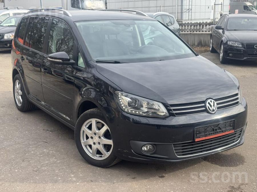 Black Volkswagen Touran 2013 in Riga, with an engine capacity of 1.40 L and mileage of 225 thousand km for 6950 €, photo 5 on AUTOMOTO.COM.LV