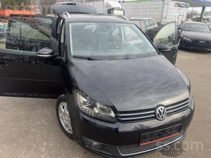 Black Volkswagen Touran 2013 in Riga, with an engine capacity of 1.40 L and mileage of 225 thousand km for 6950 €, photo 7 on AUTOMOTO.COM.LV