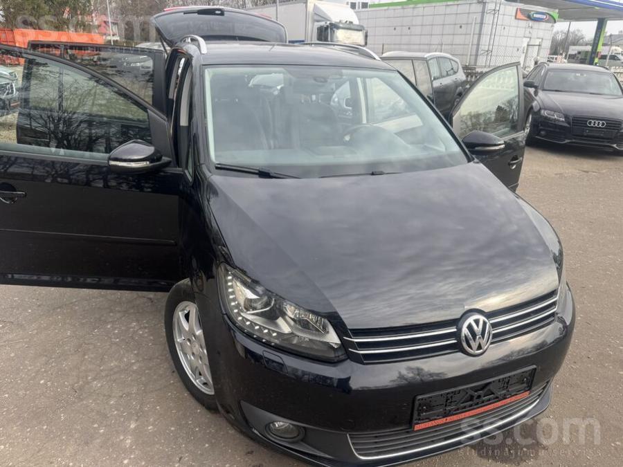 Black Volkswagen Touran 2013 in Riga, with an engine capacity of 1.40 L and mileage of 225 thousand km for 6950 €, photo 7 on AUTOMOTO.COM.LV
