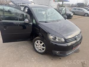 Black Volkswagen Touran 2013 in Riga, with an engine capacity of 1.40 L and mileage of 225 thousand km for 6950 €, photo 8 on AUTOMOTO.COM.LV