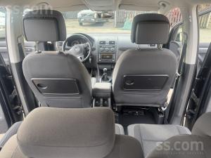 Black Volkswagen Touran 2013 in Riga, with an engine capacity of 1.40 L and mileage of 225 thousand km for 6950 €, photo 14 on AUTOMOTO.COM.LV
