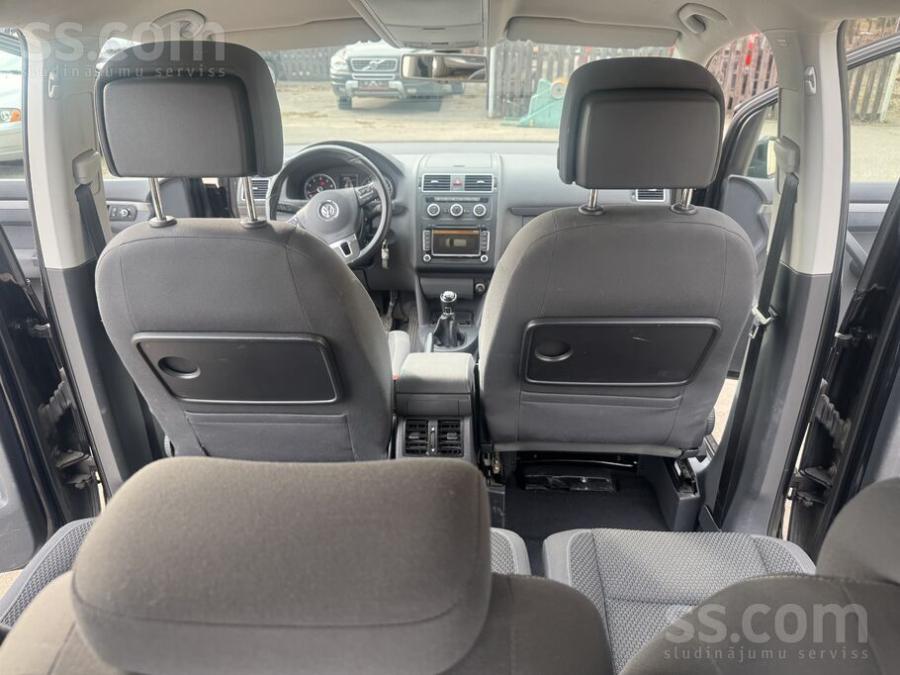Black Volkswagen Touran 2013 in Riga, with an engine capacity of 1.40 L and mileage of 225 thousand km for 6950 €, photo 14 on AUTOMOTO.COM.LV