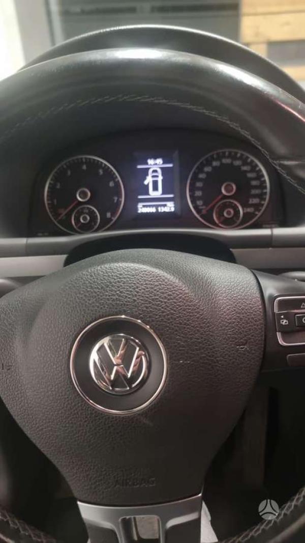 Black Volkswagen Touran 2013 in Kaunas, with an engine capacity of 1.39 L and mileage of 234 thousand km for 5100 €, photo 6 on AUTOMOTO.COM.LV