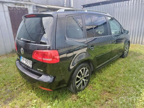 Melns Volkswagen Touran 2013 Rīga, ar dzinēja tilpumu 2.00 L un nobraukumu 300 tūkst. km par 3800 €, foto 4 vietnē AUTOMOTO.COM.LV