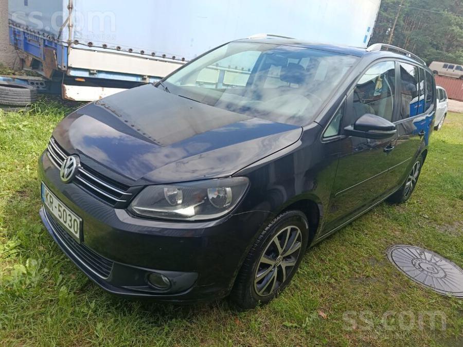 Melns Volkswagen Touran 2013 Rīga, ar dzinēja tilpumu 2.00 L un nobraukumu 300 tūkst. km par 3800 €, foto 3 vietnē AUTOMOTO.COM.LV