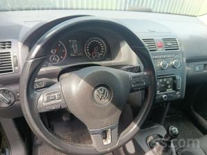 Melns Volkswagen Touran 2013 Rīga, ar dzinēja tilpumu 2.00 L un nobraukumu 300 tūkst. km par 3800 €, foto 12 vietnē AUTOMOTO.COM.LV